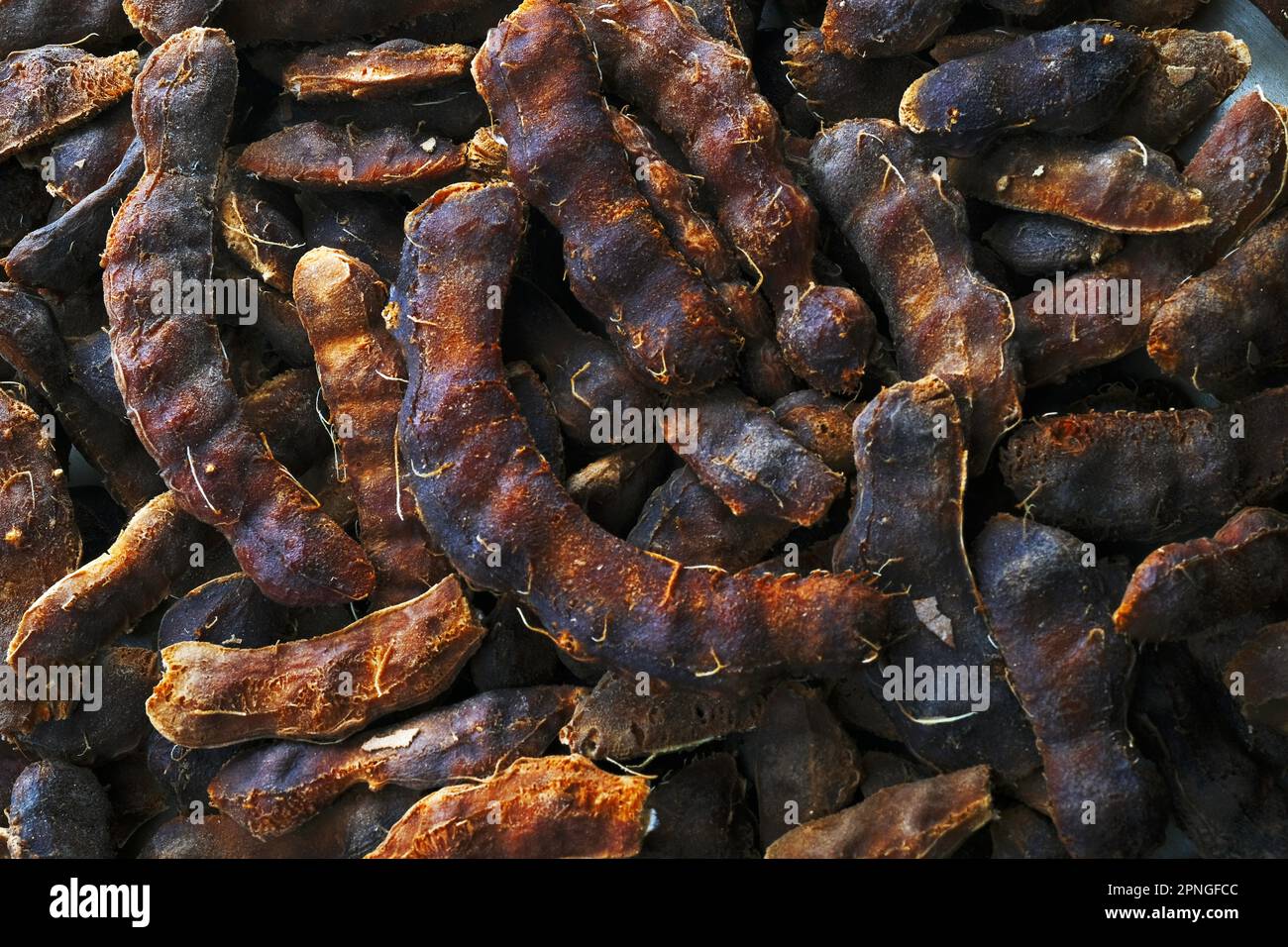 Organic tamarind peel, tamarind background, It is brown in color and ...