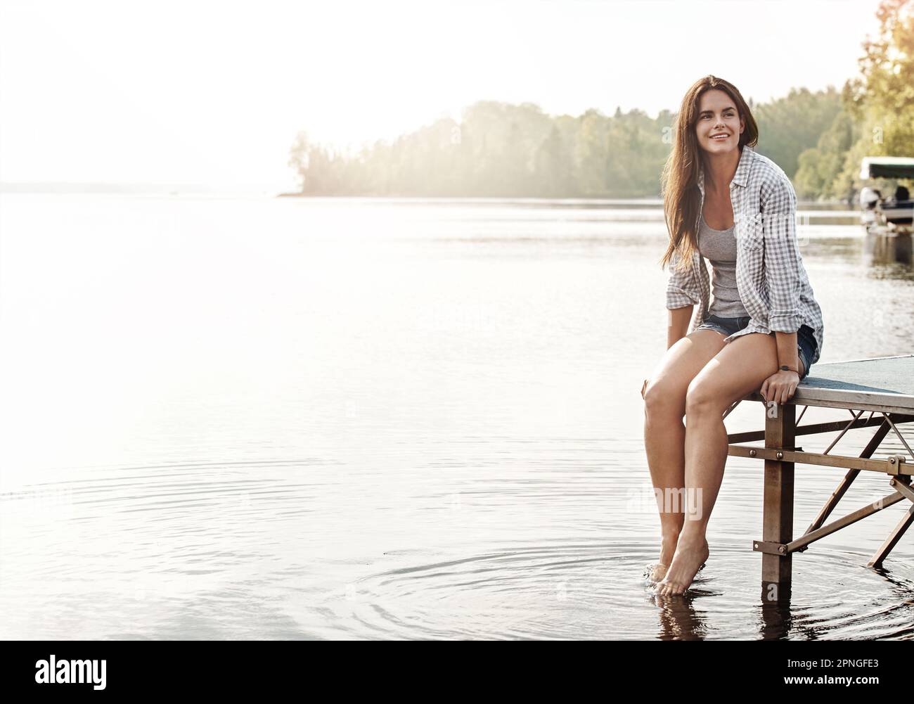 The best spot in natures house. an attractive young woman sitting on a ...