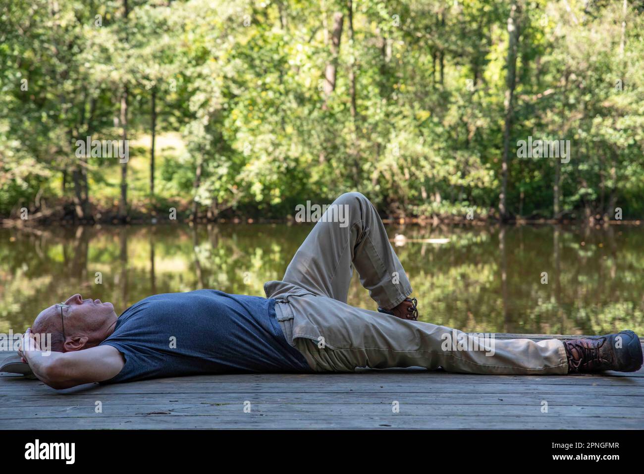 Senior lying down resting hi-res stock photography and images - Alamy