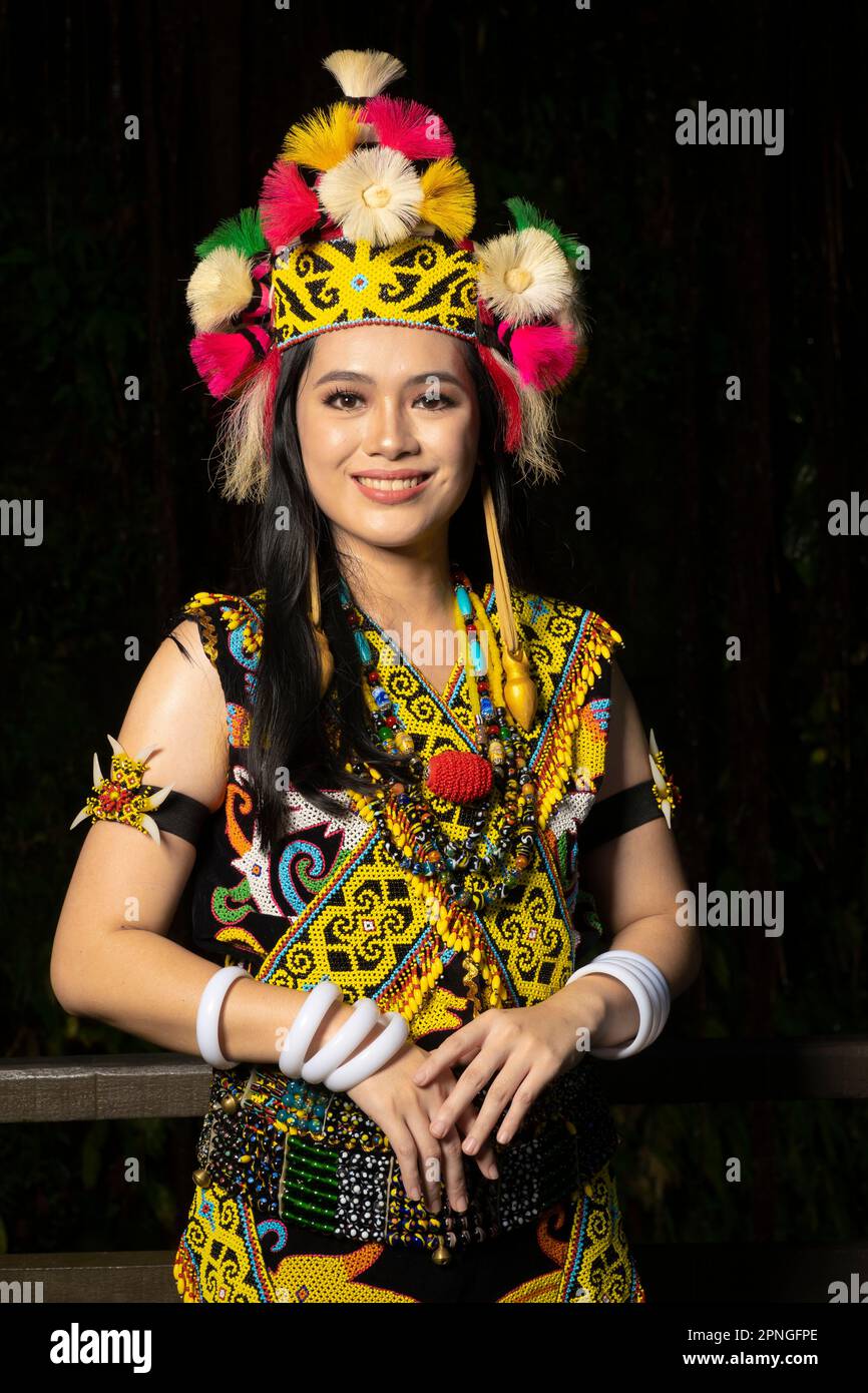 Exquisite elegance in traditional attire: A Borneo lady showcasing the ...