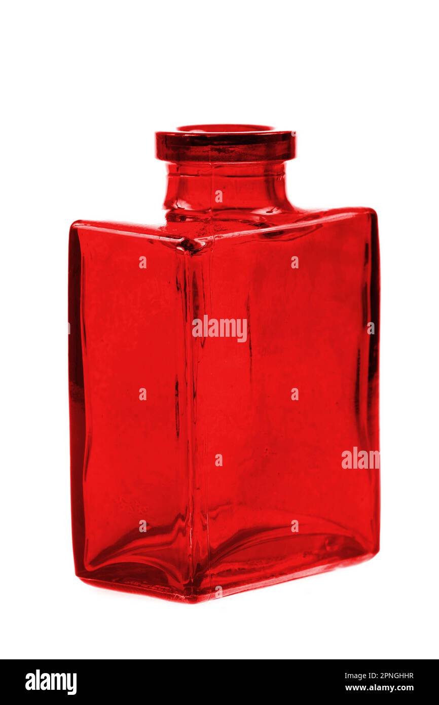red glass bottle isolated on the white background Stock Photo - Alamy