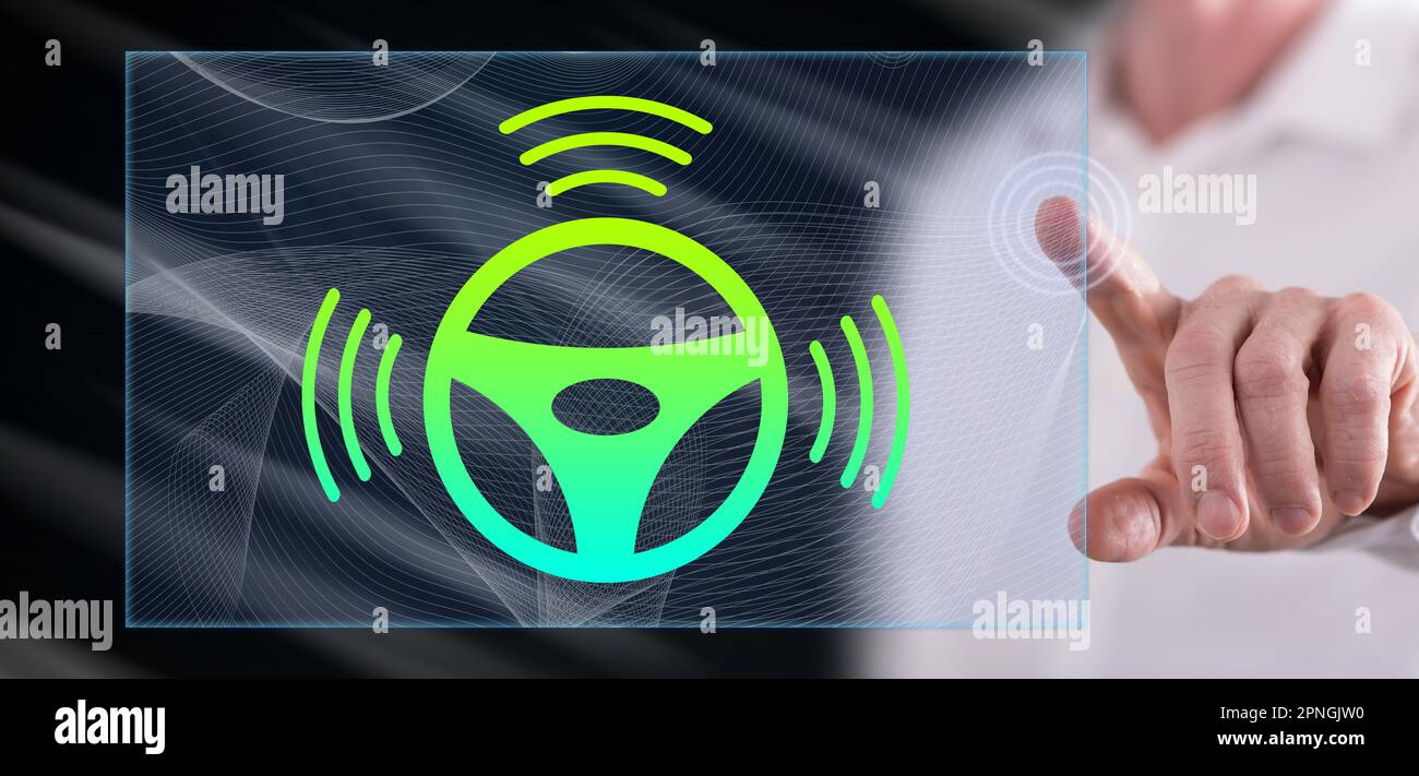 Man touching a self-driving car concept on a touch screen with his ...