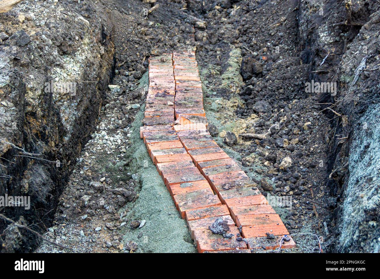 An underground electrical cable was opened to eliminate a cable break ...