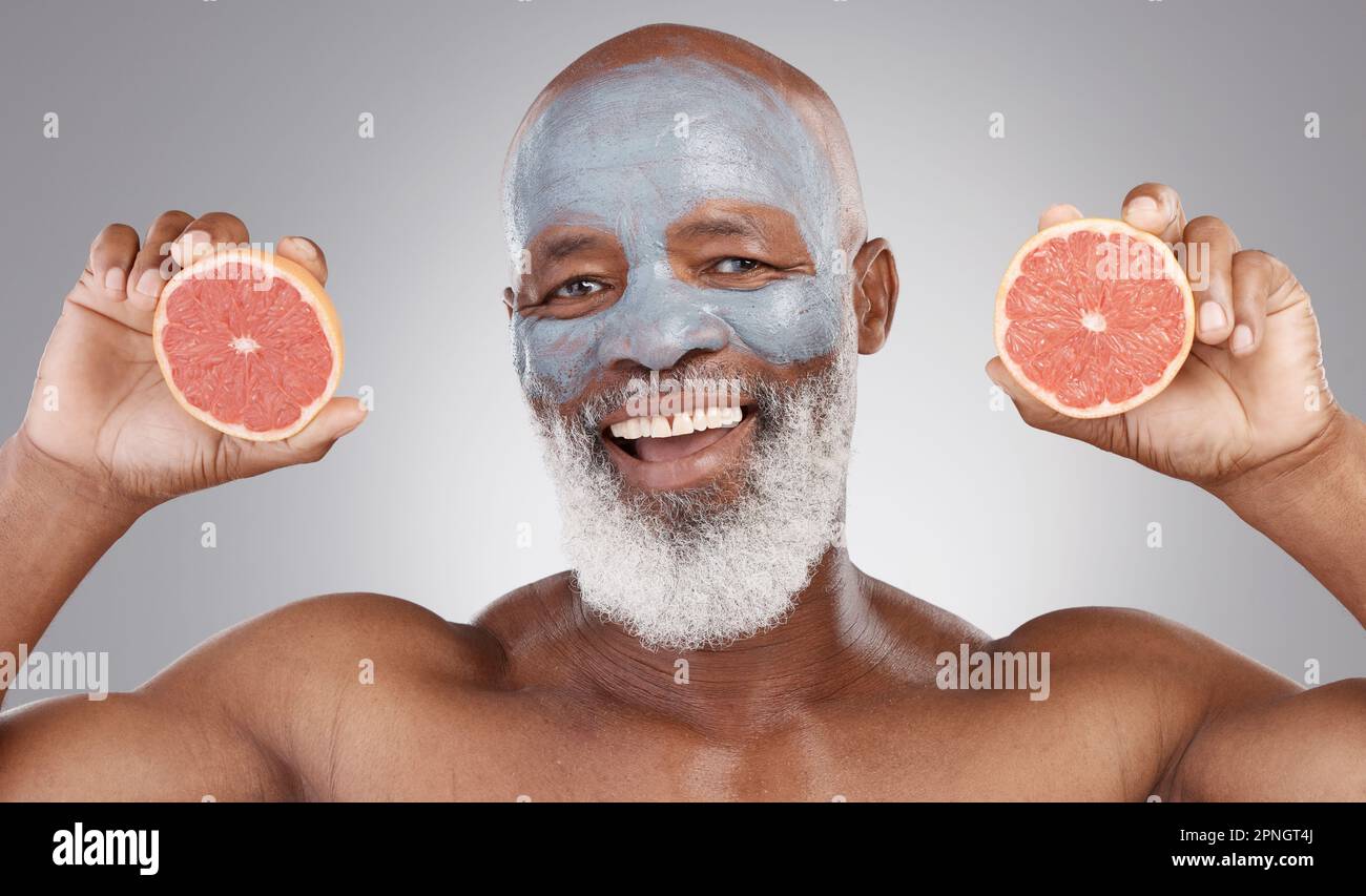 Senior black man, grapefruit and portrait in skincare, vitamin C or natural nutrition against a ...