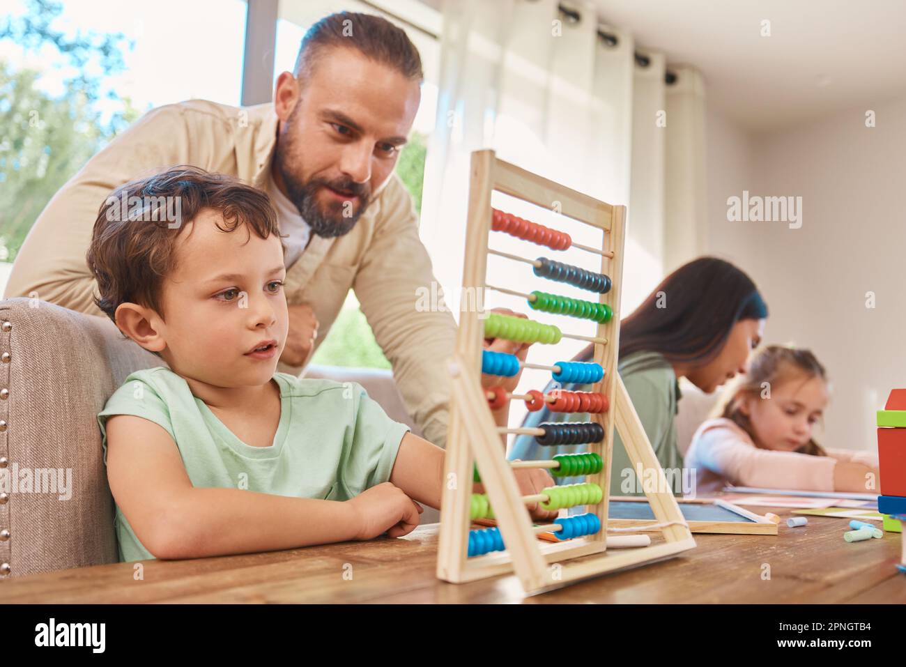 Education, home school and father with his child with abacus helping ...