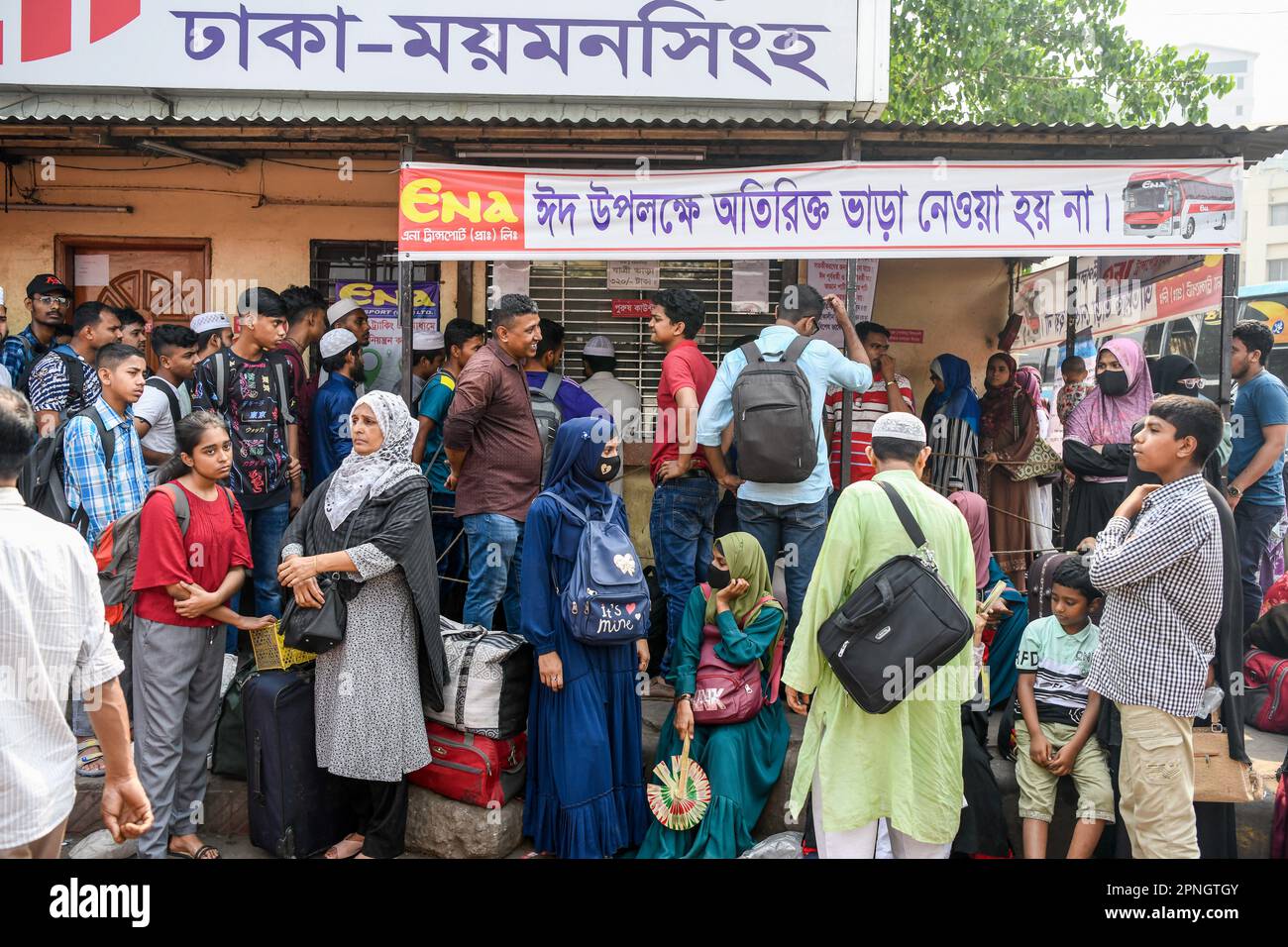 Dhaka, Bangladesh. 19th Apr, 2023. People are seen waiting for the bus ...