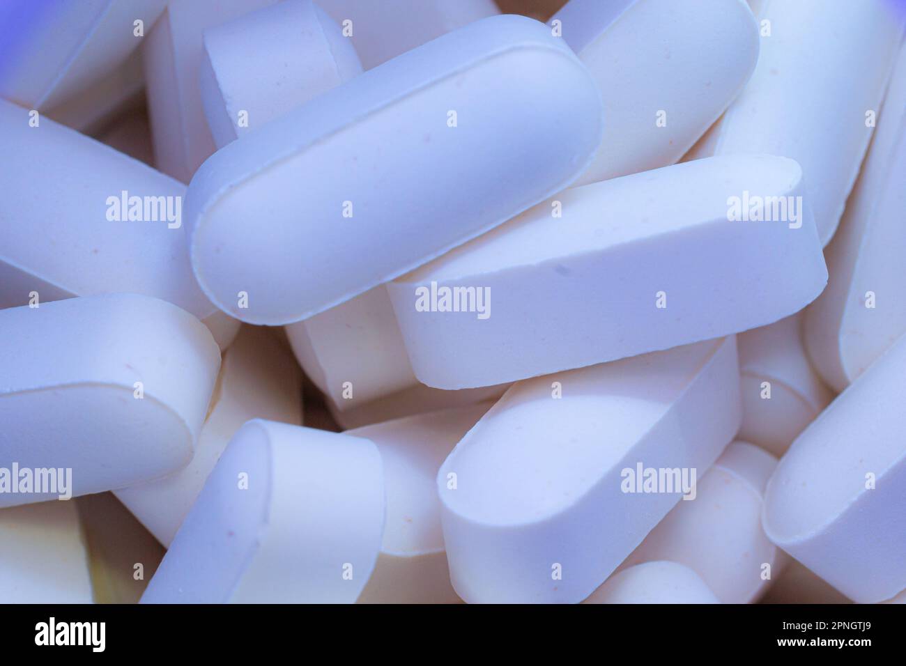 Pills drugs tablets vitamins macro image close up white. Medicine ...