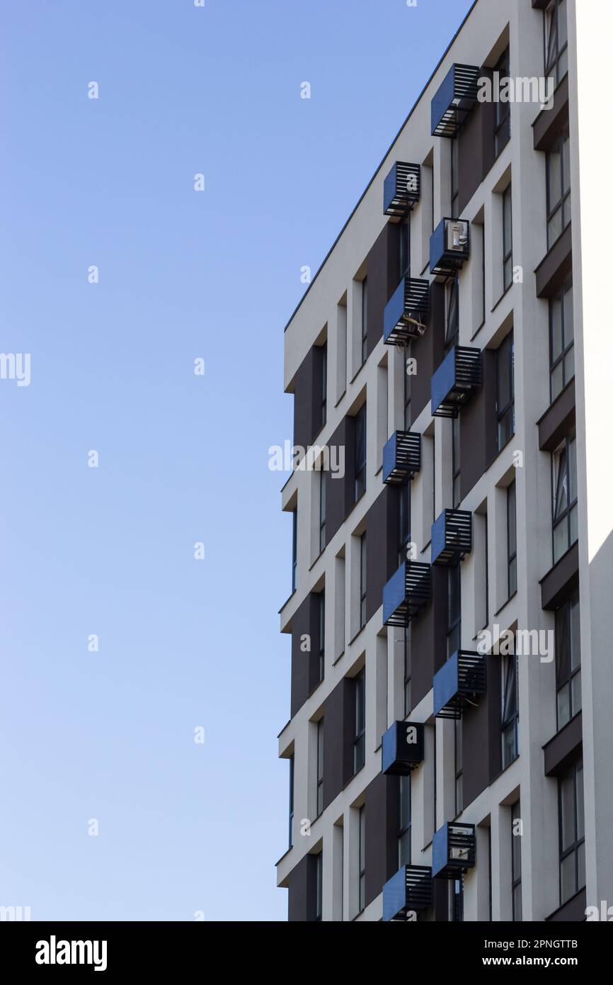 Architectural details of modern high apartment building facade with ...