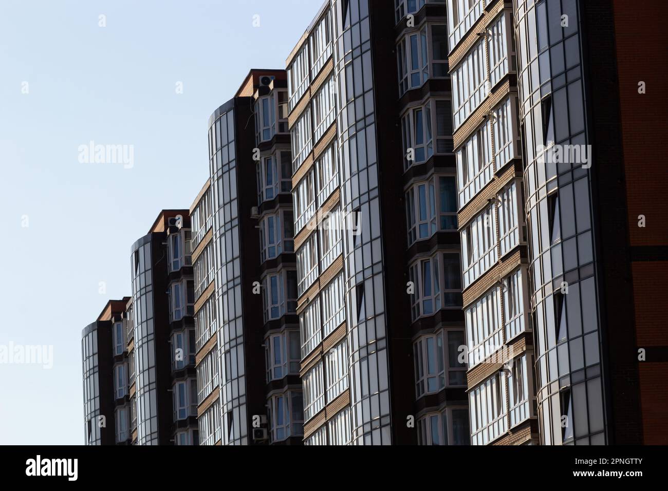 Architectural details of modern high apartment building facade with ...