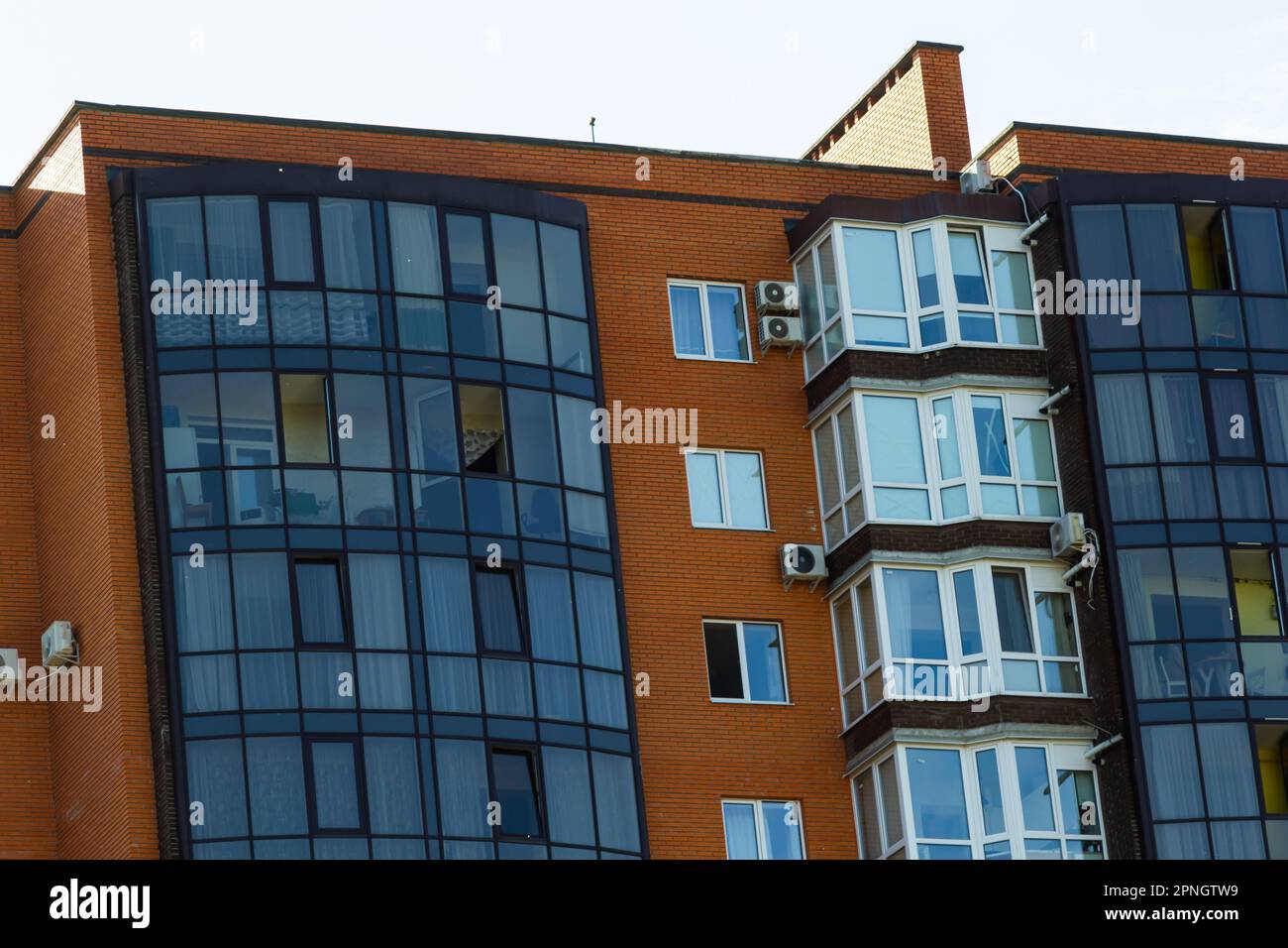 Architectural details of modern high apartment building facade with ...