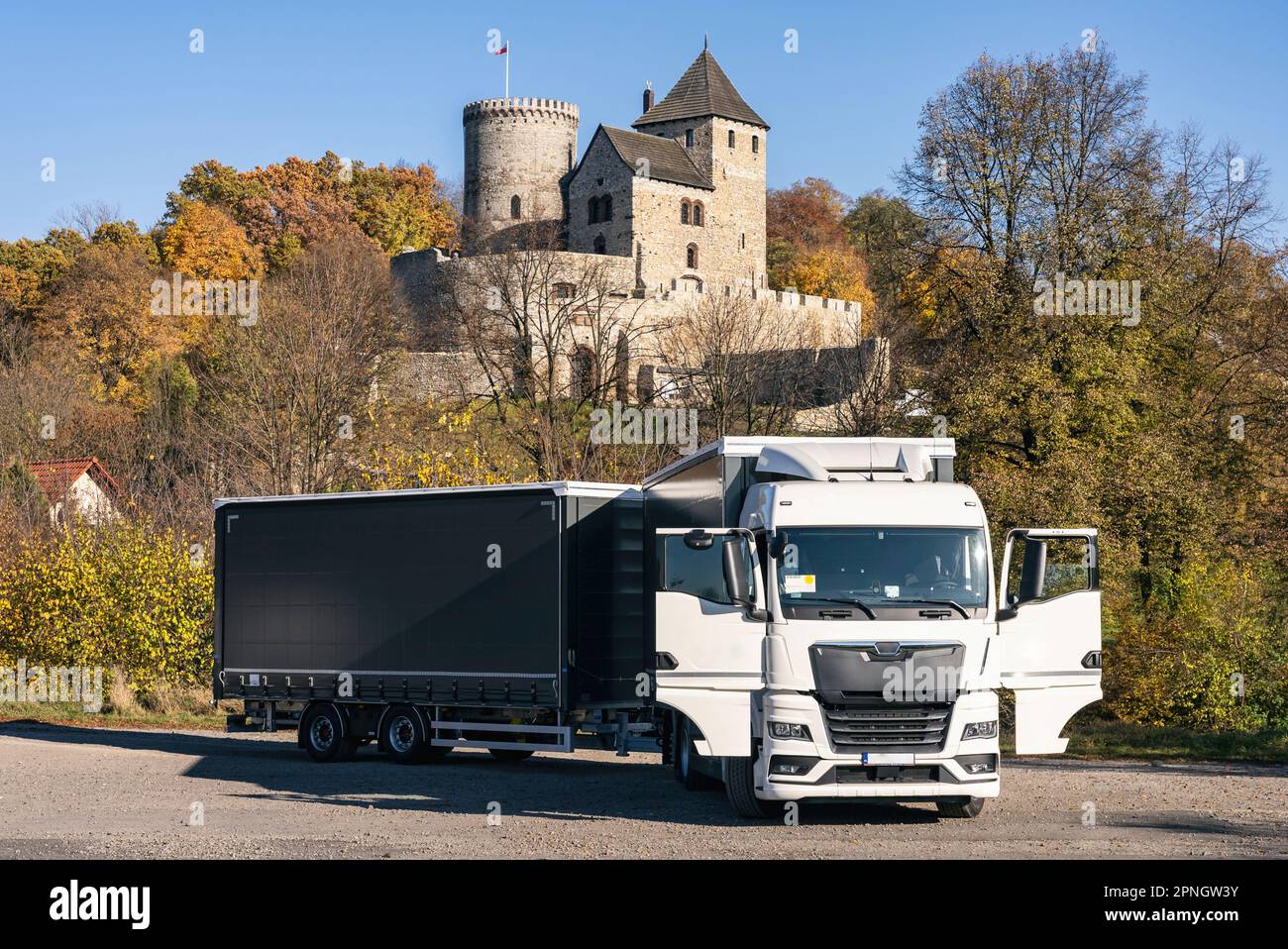 Truck on the background of the castle. Truck with semi-trailer in gray ...