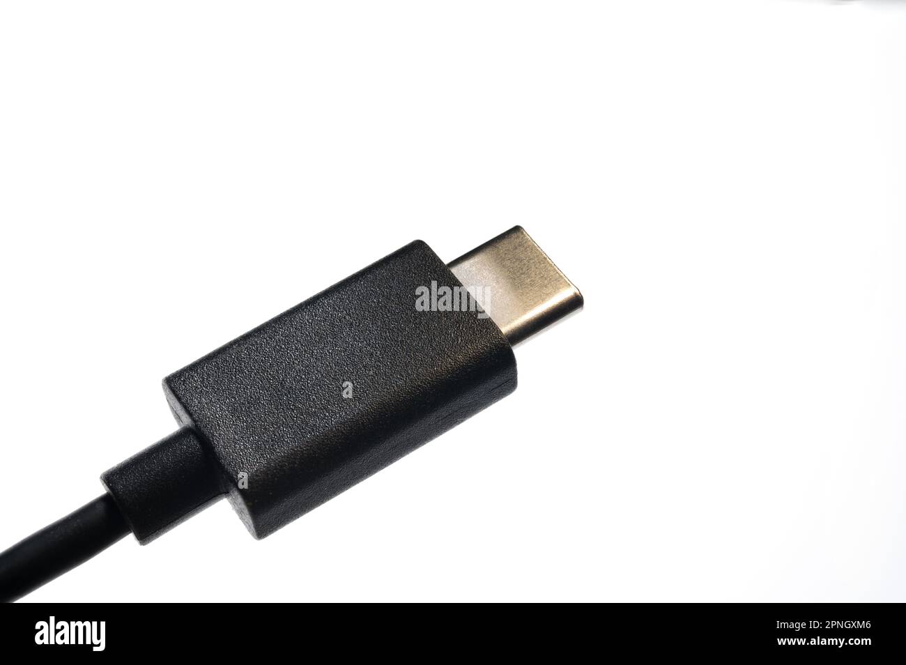 Close up of black USB-C cable with plug on white background with copy ...