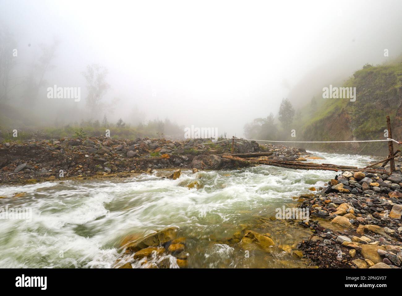 Sulphur rich river flowing down from the peak of Mount Rinjani in ...
