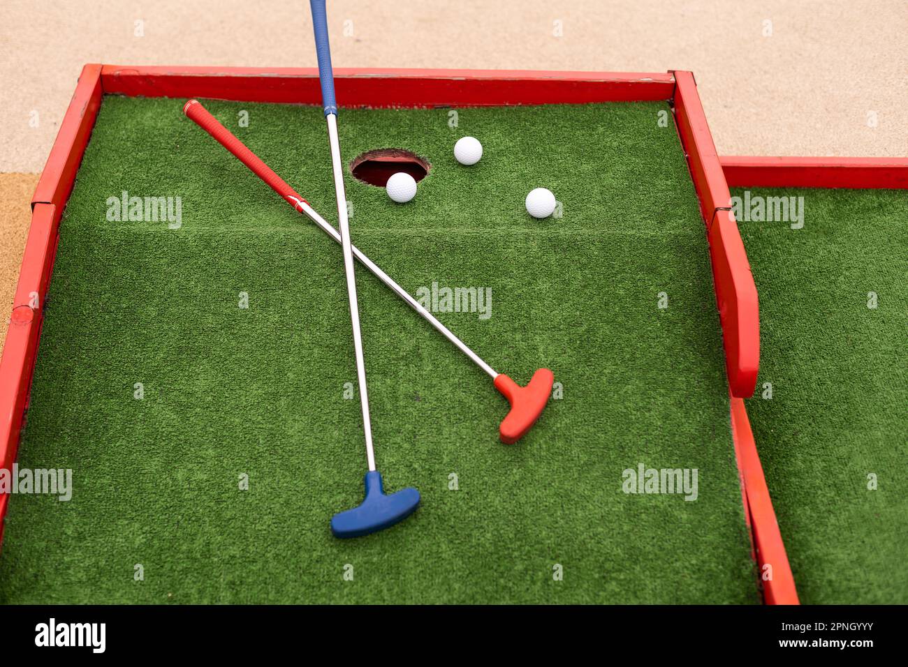 golf club, ball and hole Stock Photo - Alamy