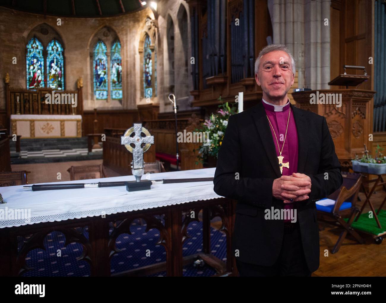 Archbishop of Wales Andrew John with The Cross of Wales ahead of a ...