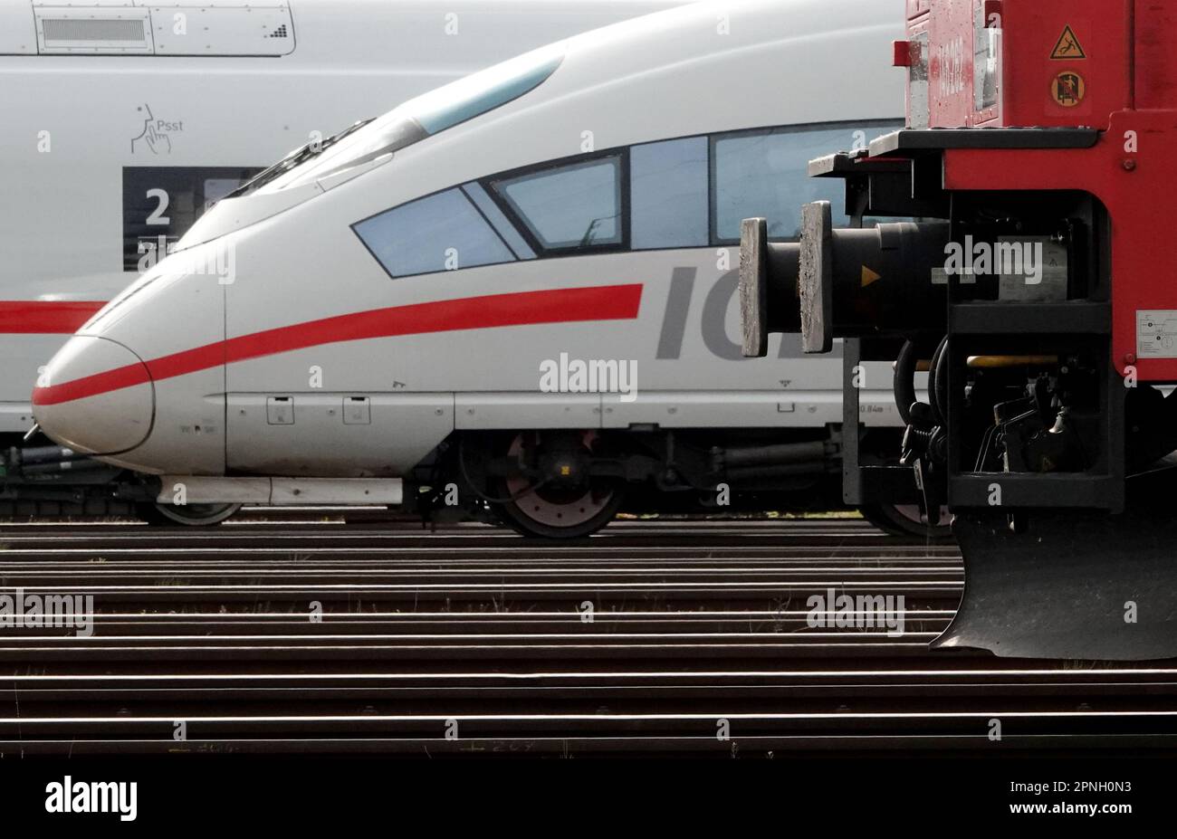 19 April 2023, Hesse, Frankfurt/Main: Deutsche Bahn ICE trains stand on ...