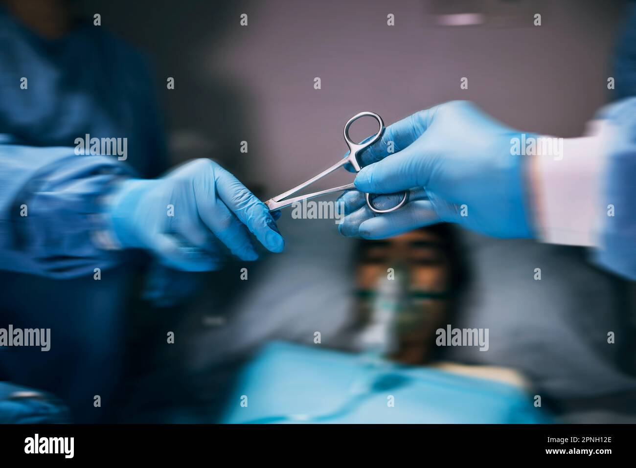 Hospital scissors, surgery and doctors hands in theatre for medical ...