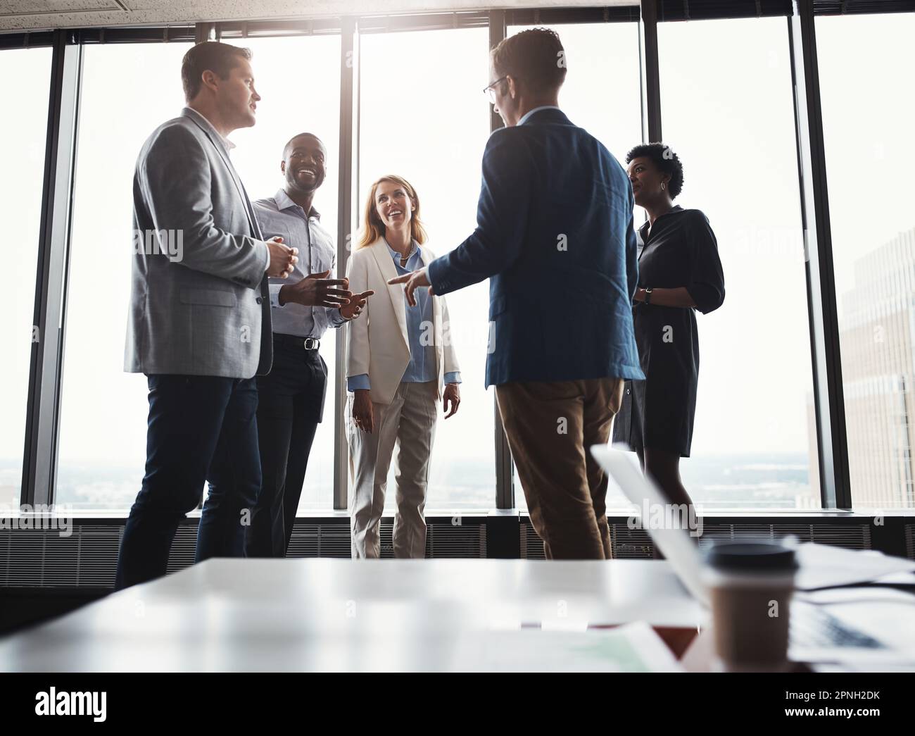 Theyre full of bright ideas. Low angle shot of a group of corporate ...