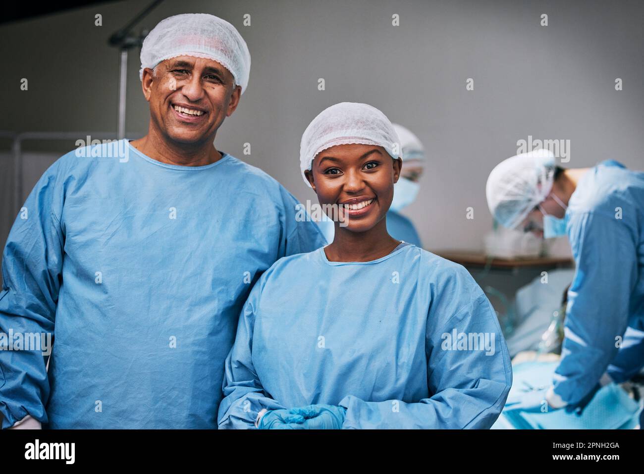 Theatre, portrait and happy doctors in hospital teamwork, leadership ...