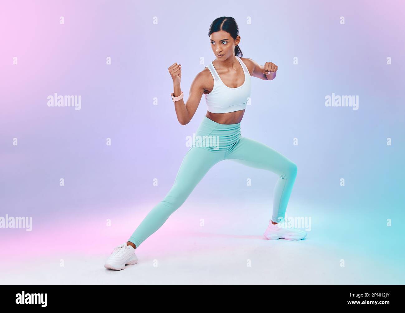 Fitness, woman and fighting pose in studio for karate, martial arts or ...