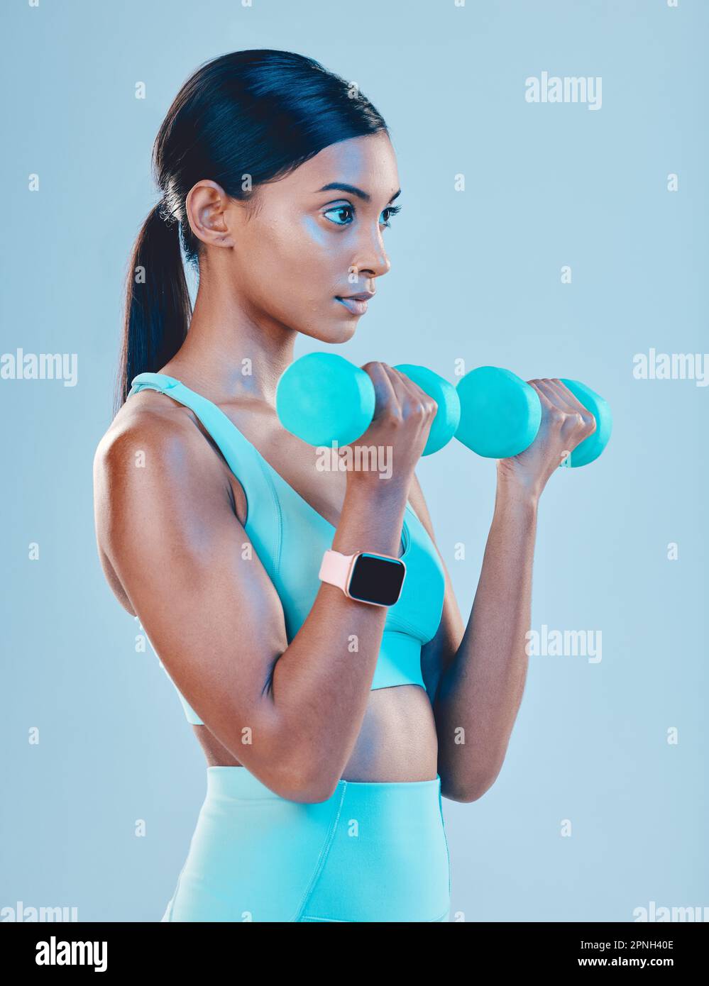 Fitness, workout and woman with weights in a studio for a arm or ...