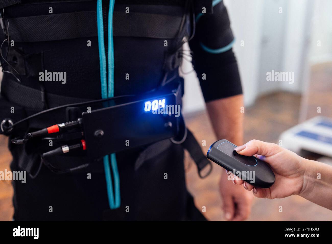 Using the remote control. Trainer sets the necessary parameters on ...