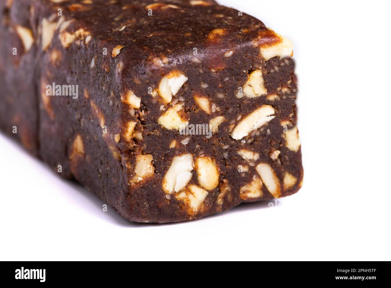 Raw pressed date with nuts and fruit bars isolated on white background ...