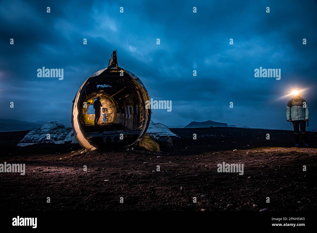 Iceland - August 2021: Artistic shot of a man with lights into the old ...