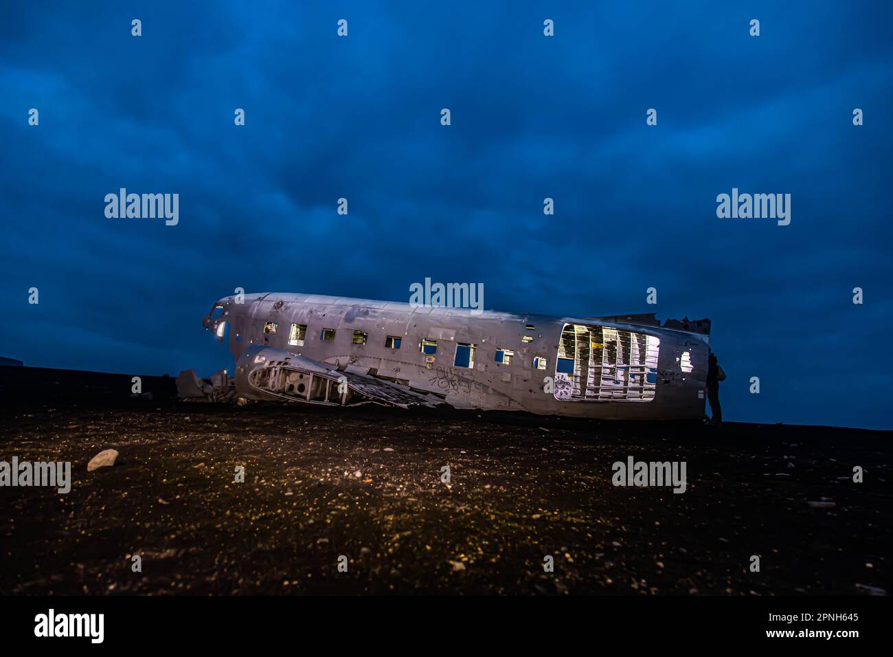 Iceland - August 2021: Night view of the old crashed plane wreck ...