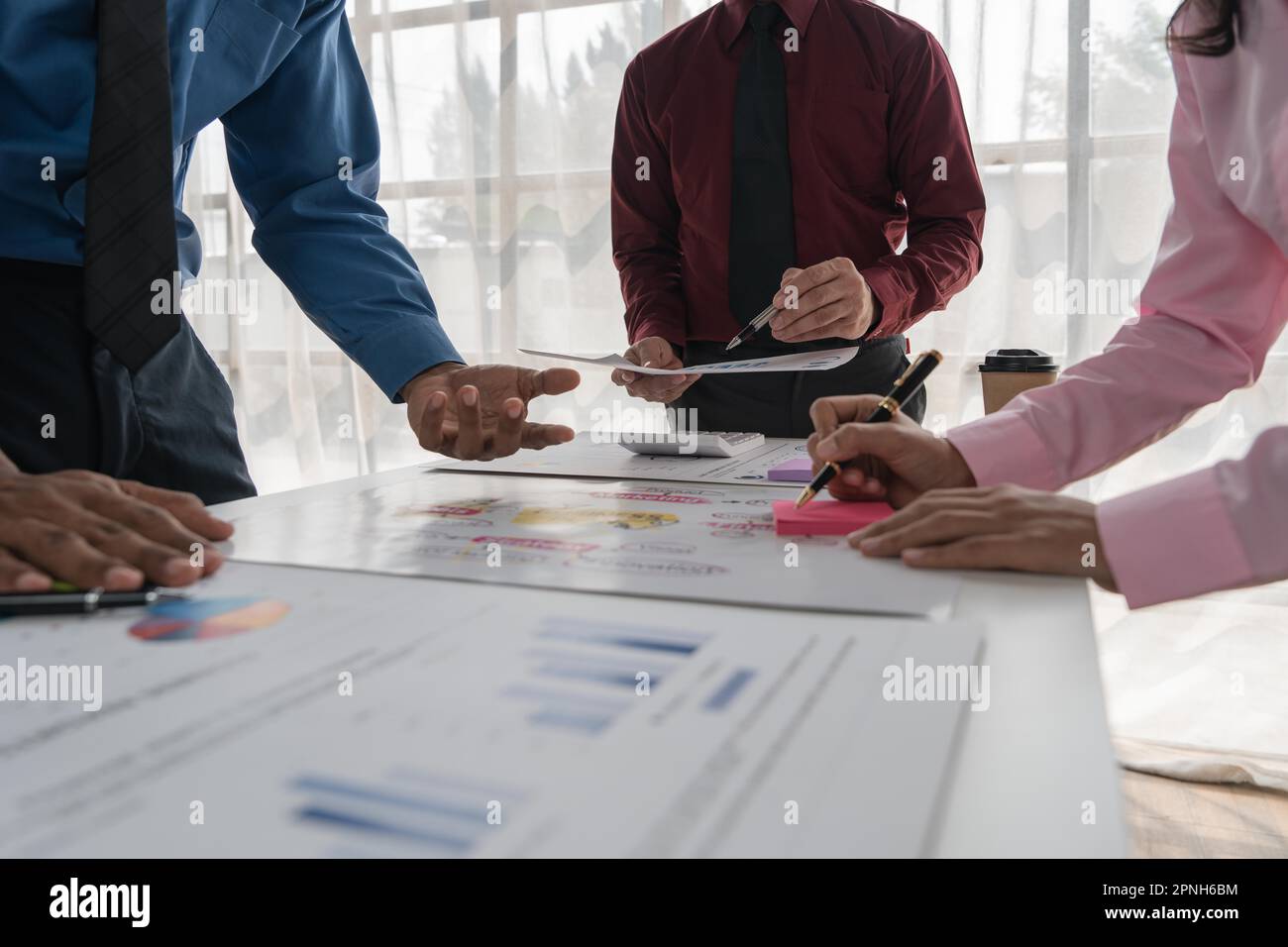 business meeting in office planning, goals or mission at desk with ...