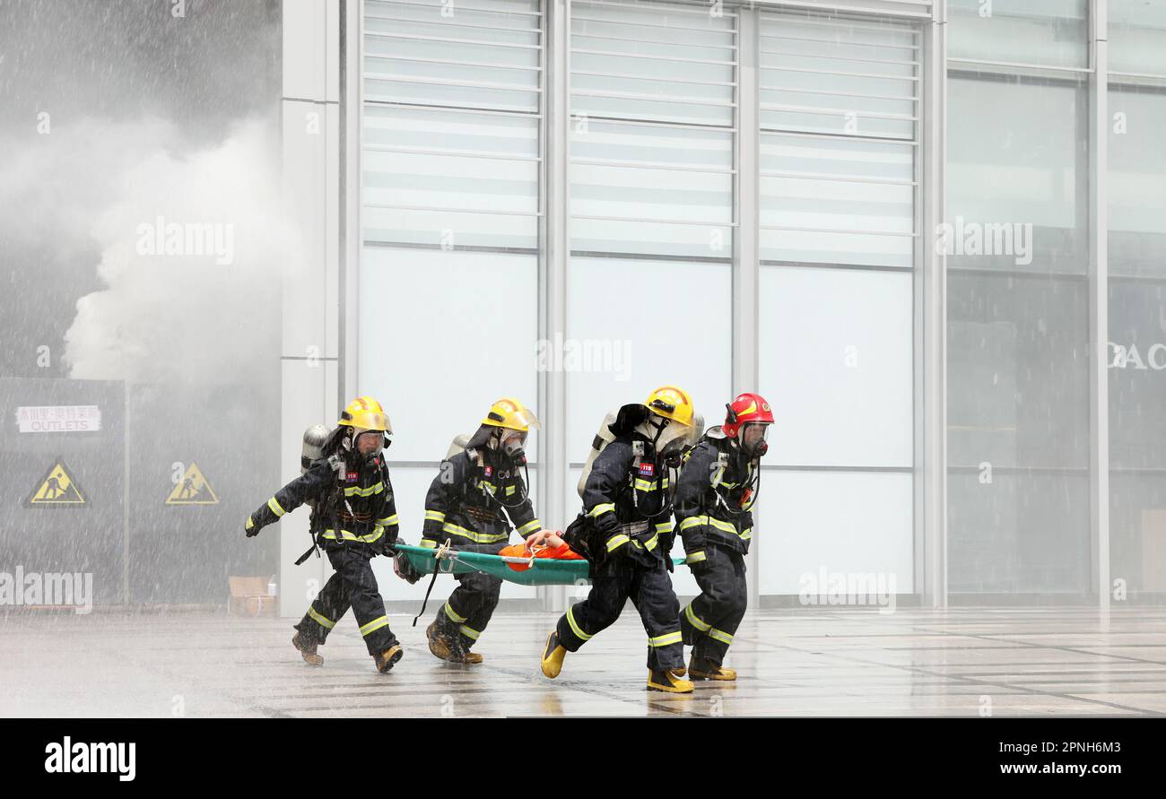 CHONGQING, CHINA - APRIL 19, 2023 - Fire and rescue workers rush ...