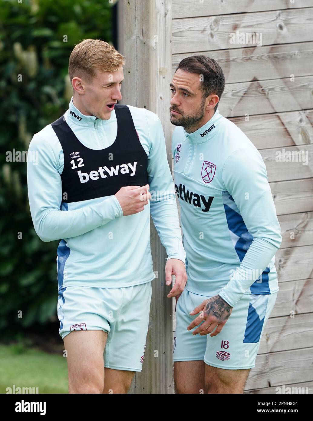 West Ham United's Danny Ings (right) jokes around with Flynn Downes ...