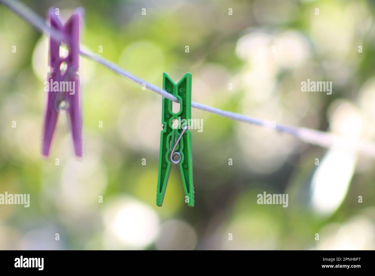 Green clothes hi-res stock photography and images - Alamy