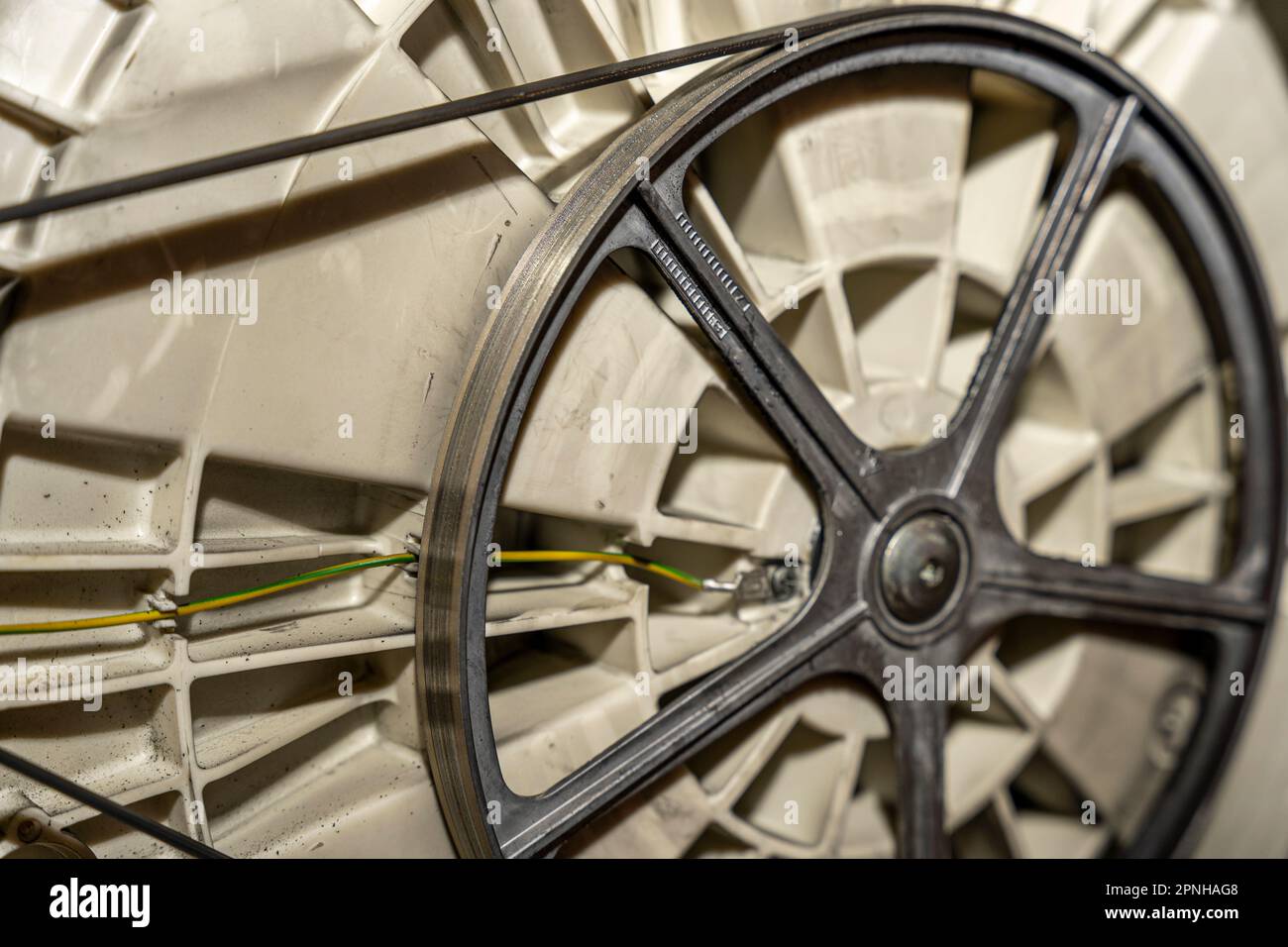 Electric motor and belt drive of an electric washing machine Stock ...