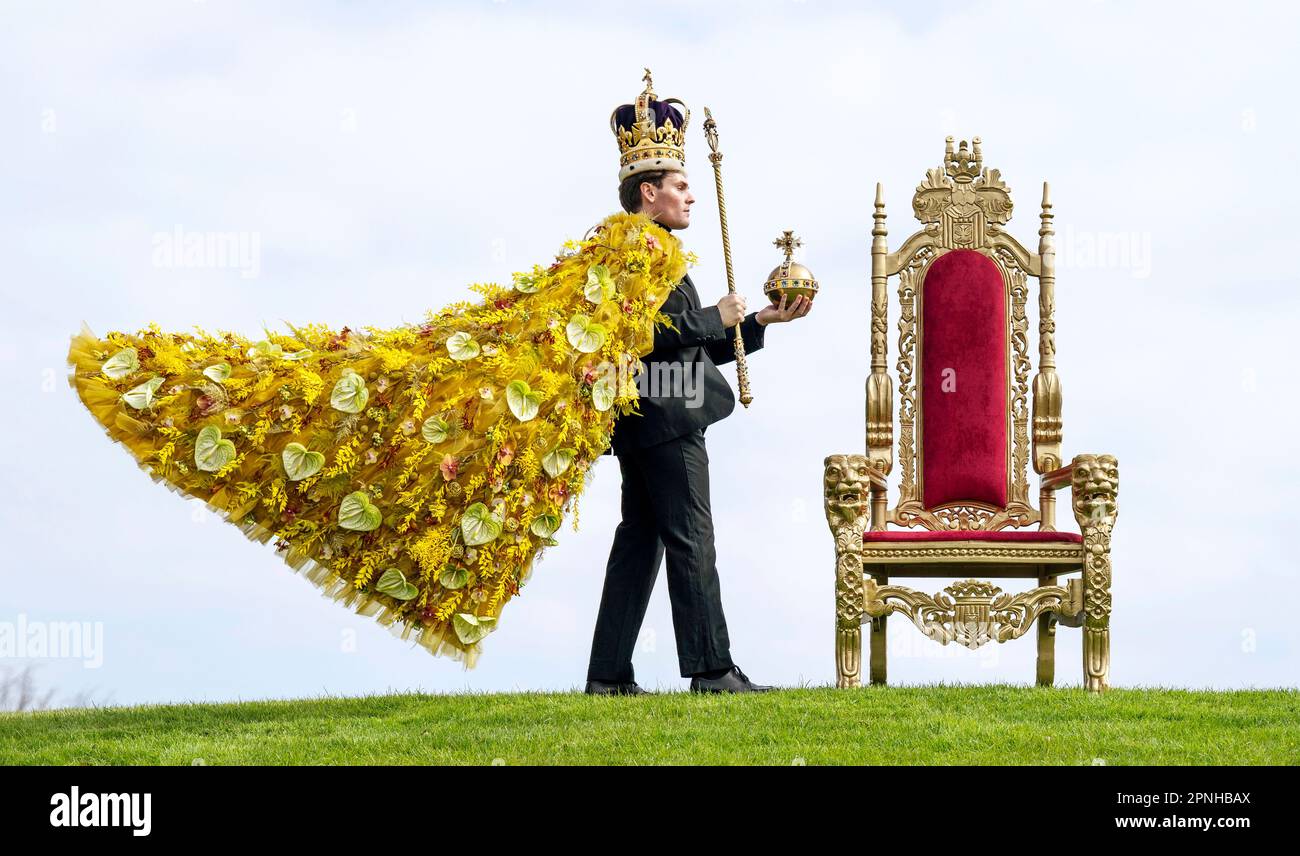 Rupert North wears a majestic robe created using an array of flowers ...
