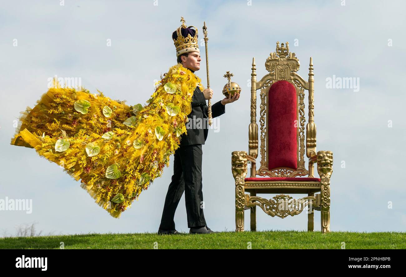 Rupert North wears a majestic robe created using an array of flowers ...
