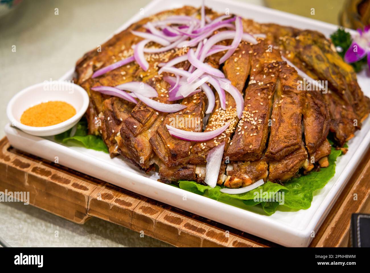 A delicious Chinese Xinjiang dish, grilled lamb chops Stock Photo - Alamy