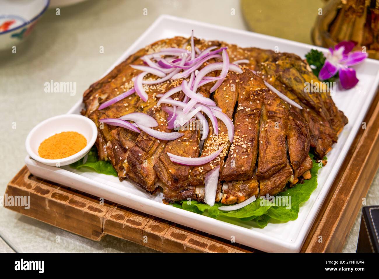 A delicious Chinese Xinjiang dish, grilled lamb chops Stock Photo - Alamy