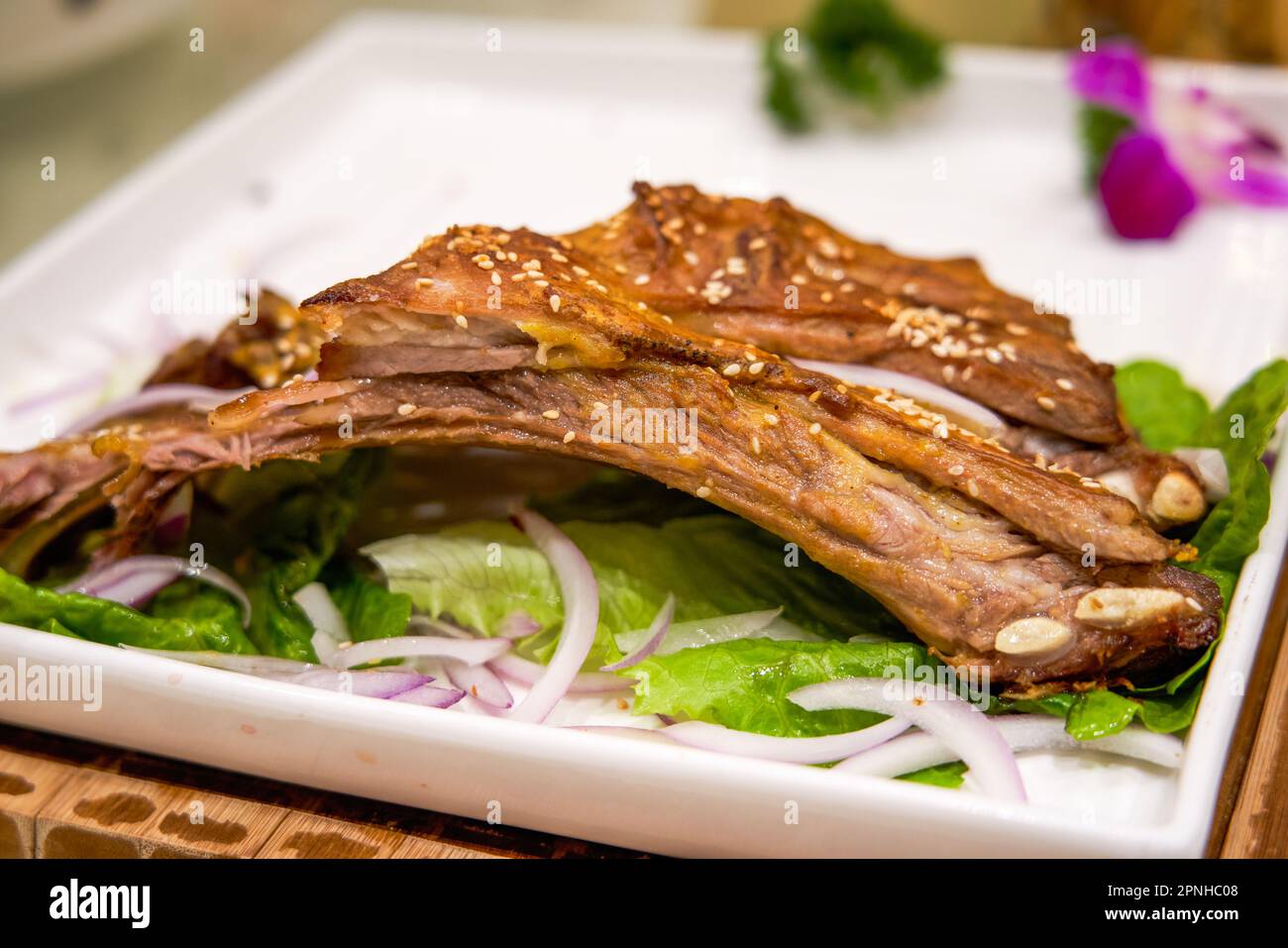 A delicious Chinese Xinjiang dish, grilled lamb chops Stock Photo - Alamy