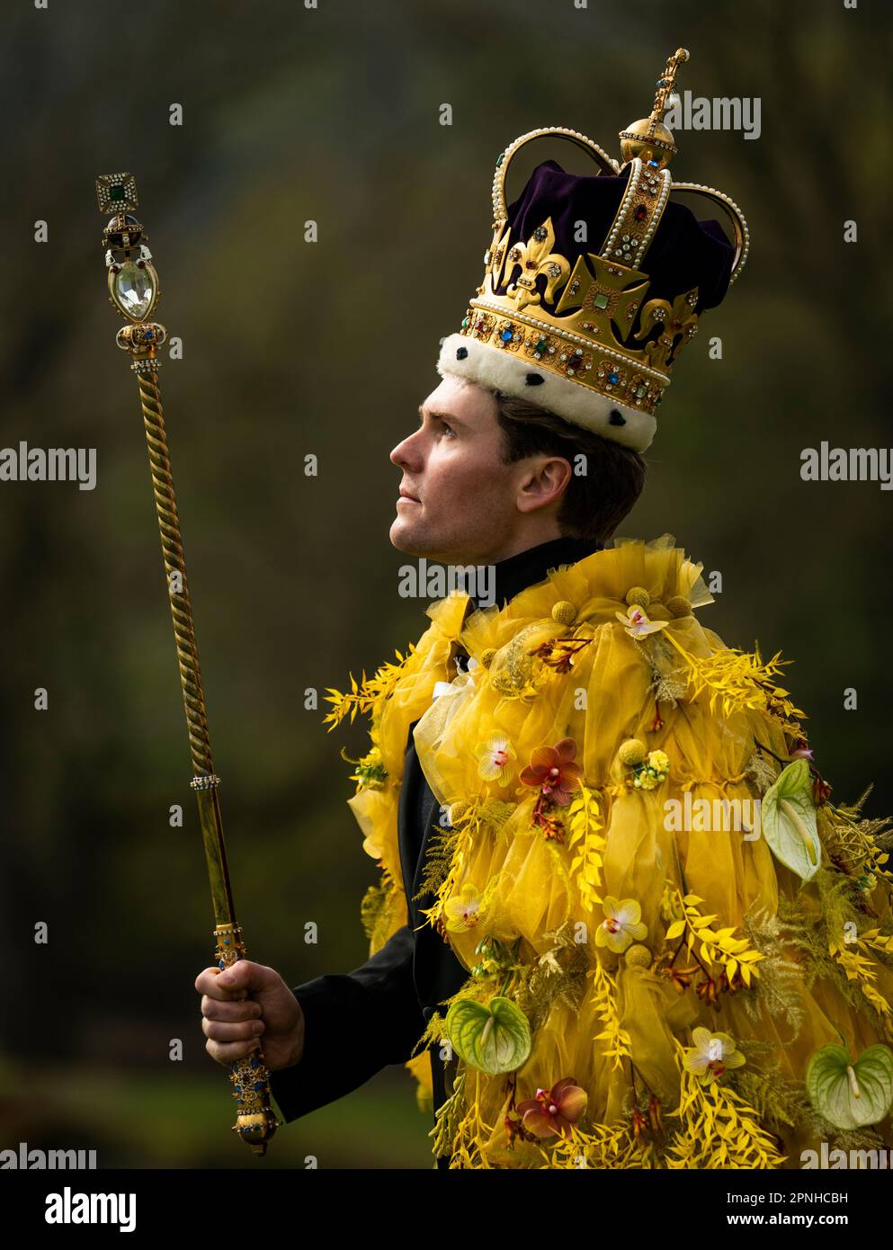 Rupert North wears a majestic robe created using an array of flowers ...