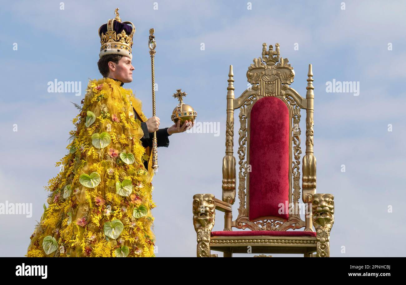 Rupert North wears a majestic robe created using an array of flowers ...