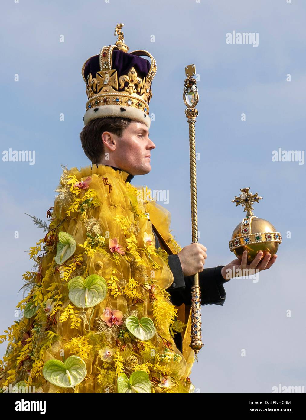 Rupert North wears a majestic robe created using an array of flowers ...