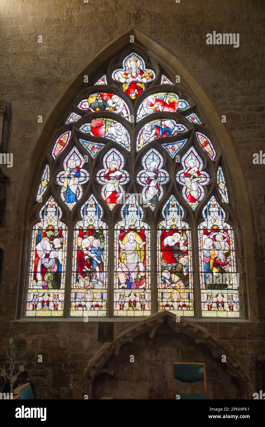Stained glass church window illustrating several religious biblical ...