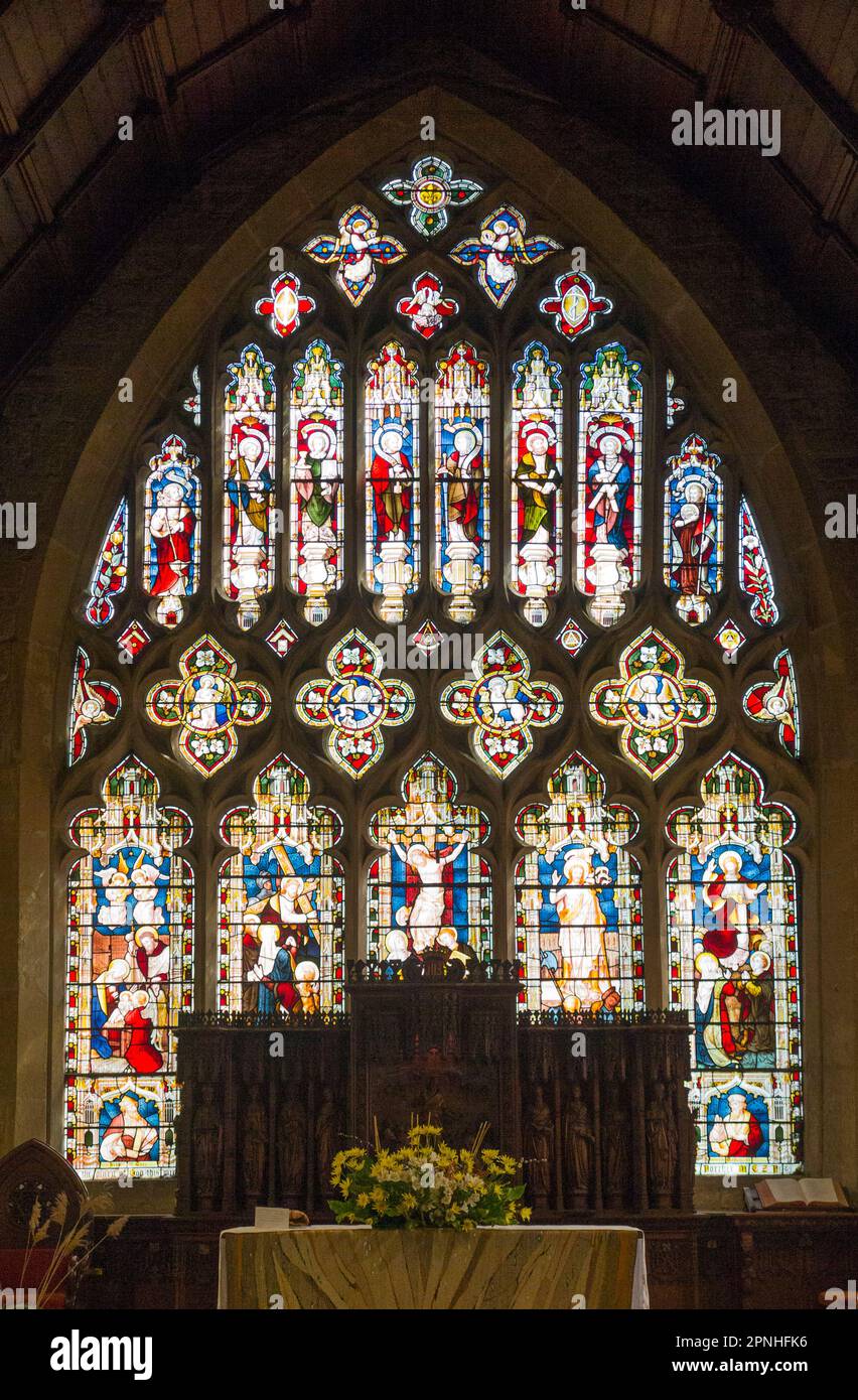 Stained glass church window overlooking the High Table beyond old choir ...