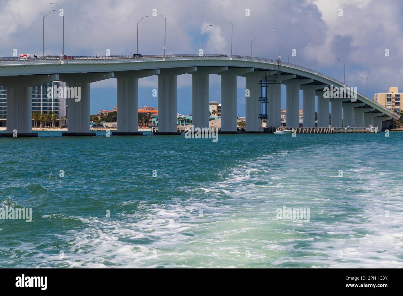 A stunning view of Causeway Byway bridge arcs over a tranquil body of ...
