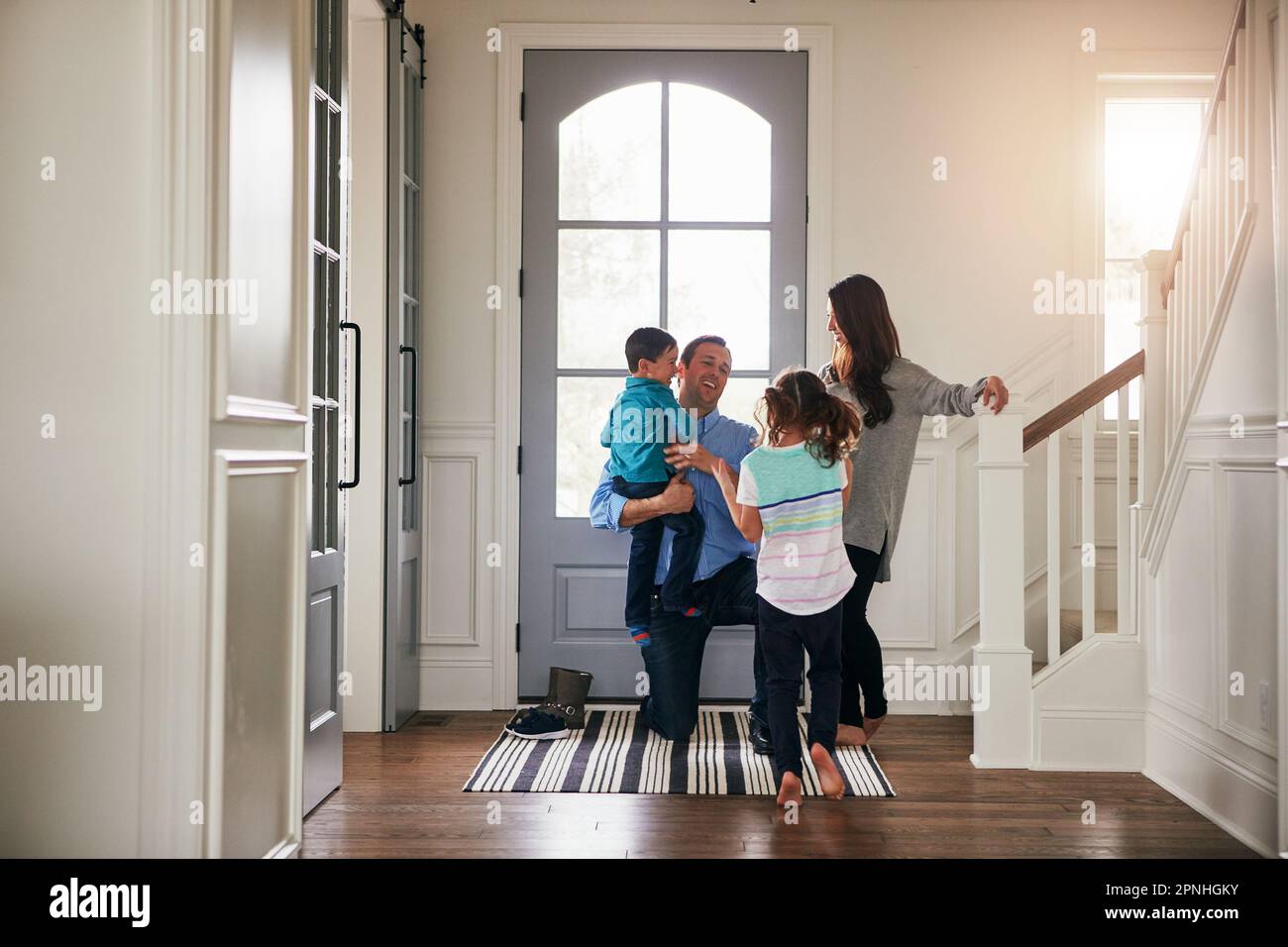 The day was long but it was worth the wait. a father arriving home to a ...