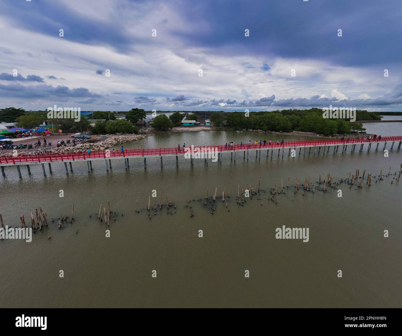 Red Boardwalk Bridge as a viewpoint near Matchanu Shrine,Samut Sakhon,Thailand. View of the ...