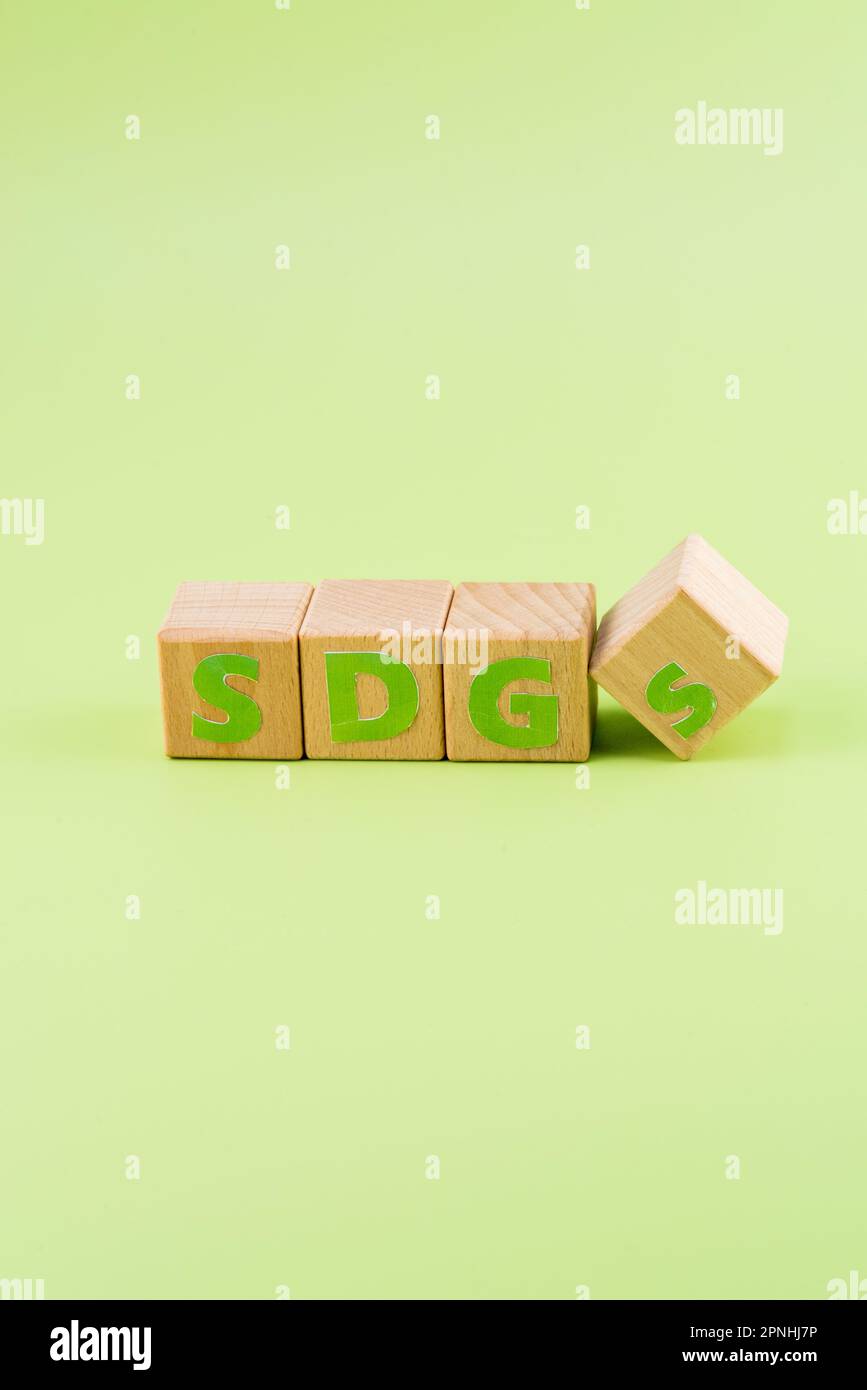 SDGs - sustainable development goals word concept on cubes Stock Photo ...