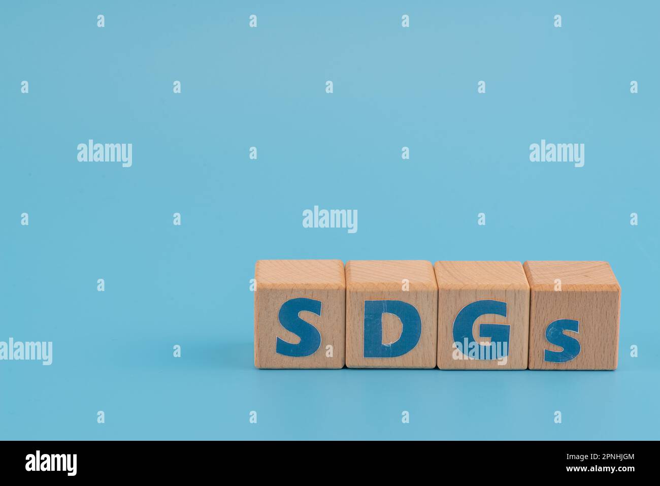 SDGs - sustainable development goals word concept on cubes Stock Photo ...