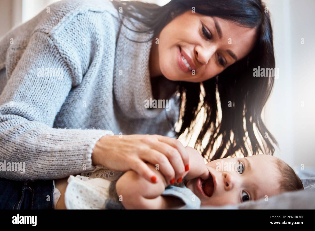But mom, Im feeling peckish. an adorable baby girl bonding with her ...